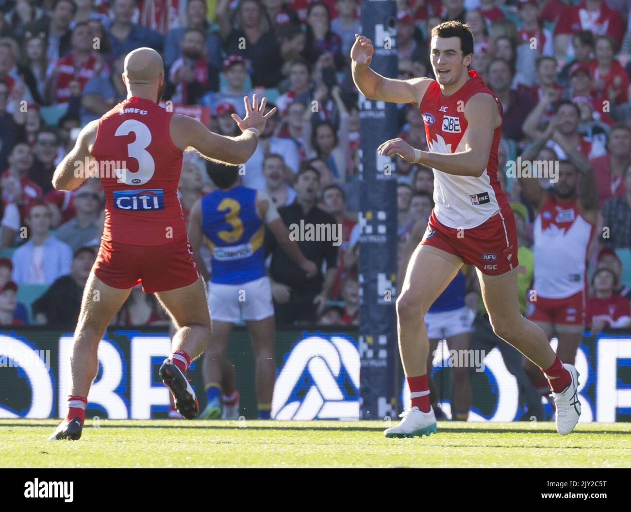 Tom McCartin of the Swans celebrates after kicking a goal during the ...