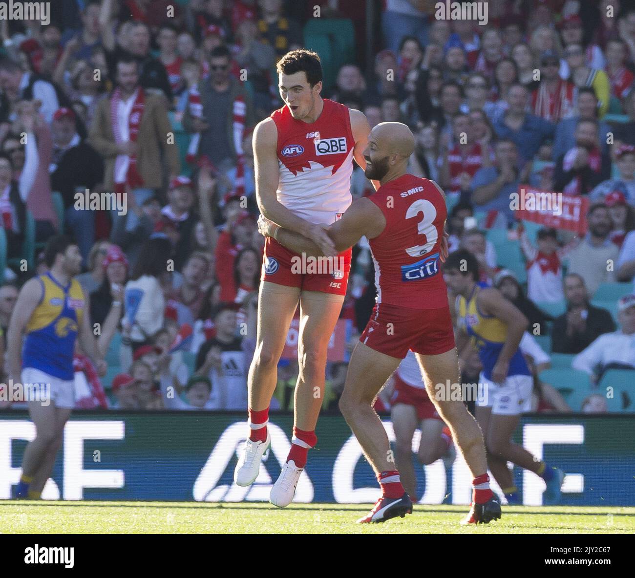 Tom McCartin of the Swans celebrates after kicking a goal during the ...