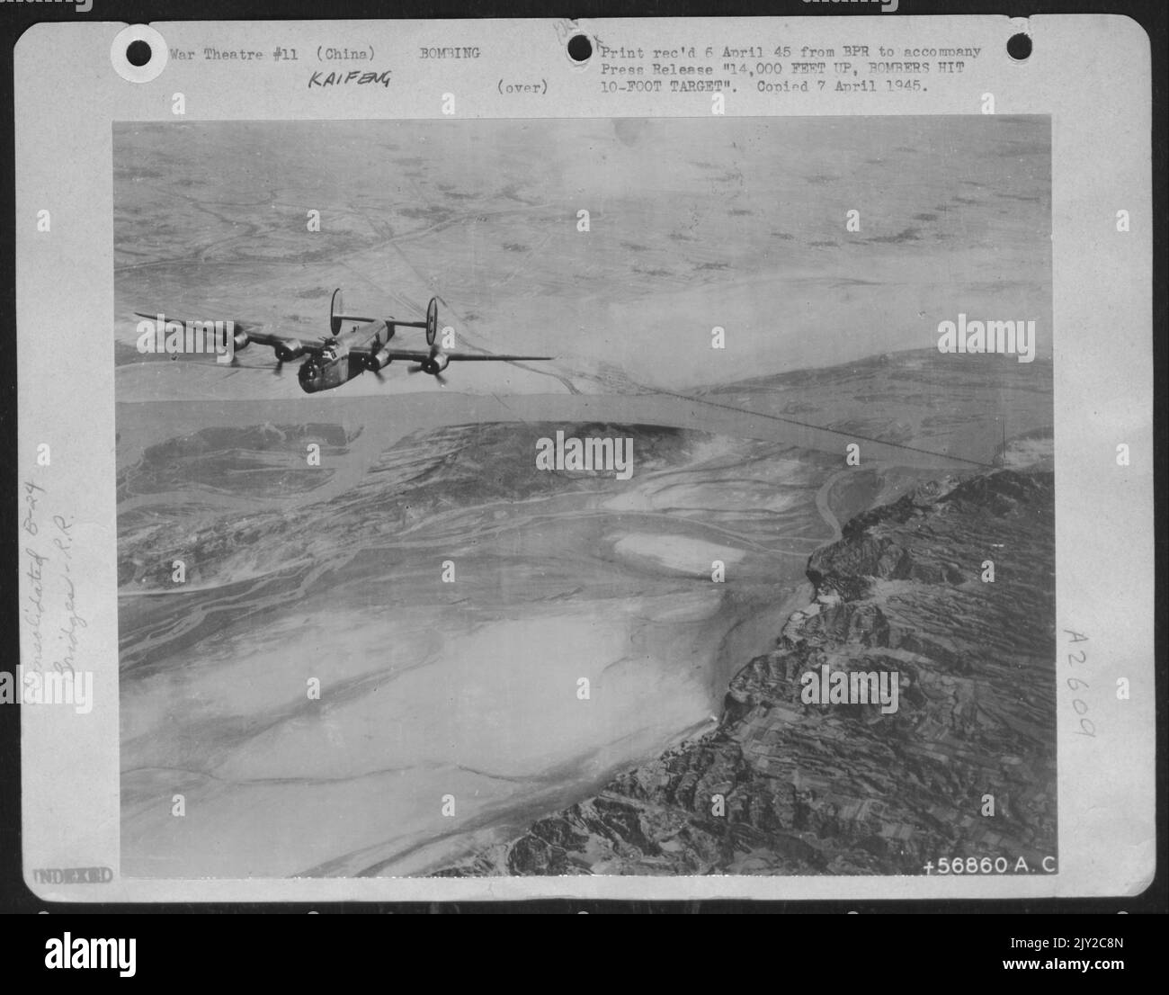 14,000 FEET UP, BOMBERS HIT 10-ofOT TARGET--Liberator bomber of the U.S ...