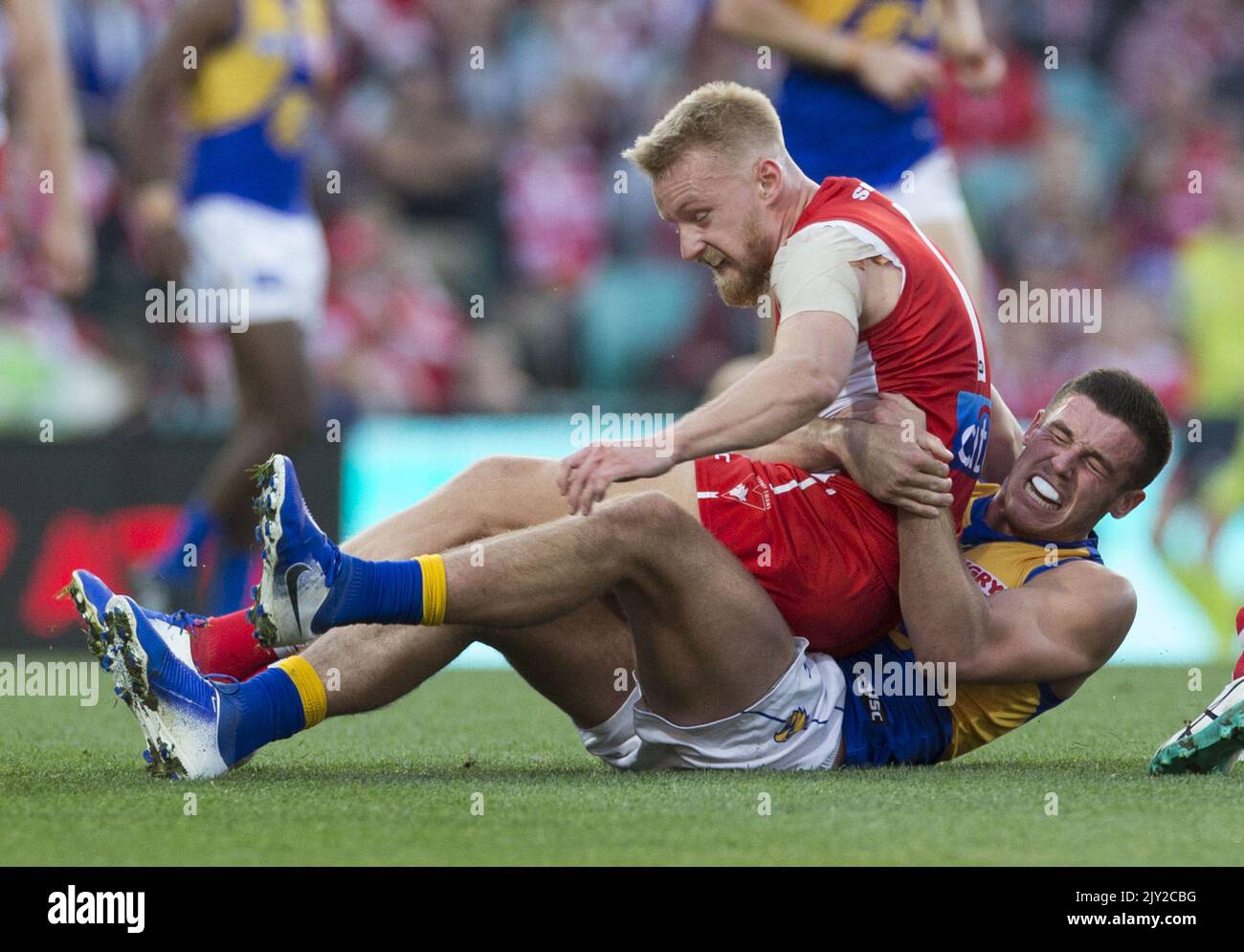 Jake Waterman of the Eagles tackles James Rose of the Swans during the ...