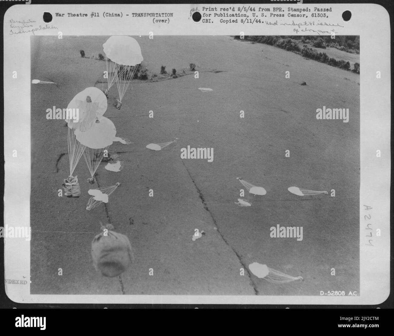 Chutes billowing in the wind, the anxiously-awaited airborne cargo ...