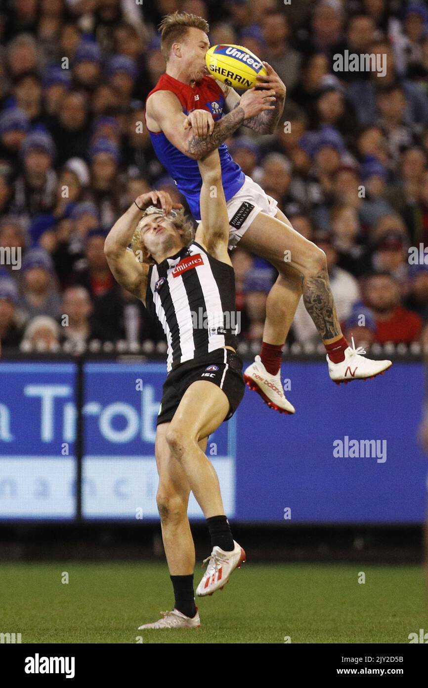 James Harmes of the Demons flies for a mark during the Round 12 AFL ...