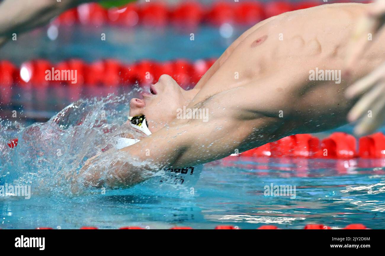 Australian swimmer Mitch Larkin (centre) in action during the final of ...