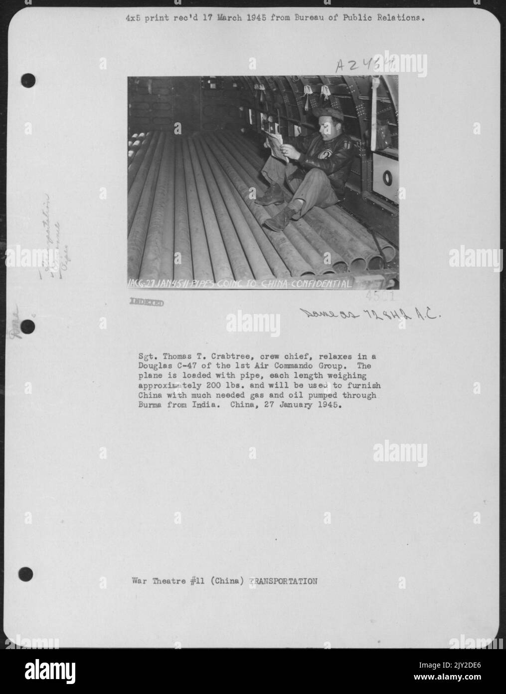 Sgt. Thomas T. Crabtree, Crew Chief, Relaxes In A Douglas C-47 Of The ...