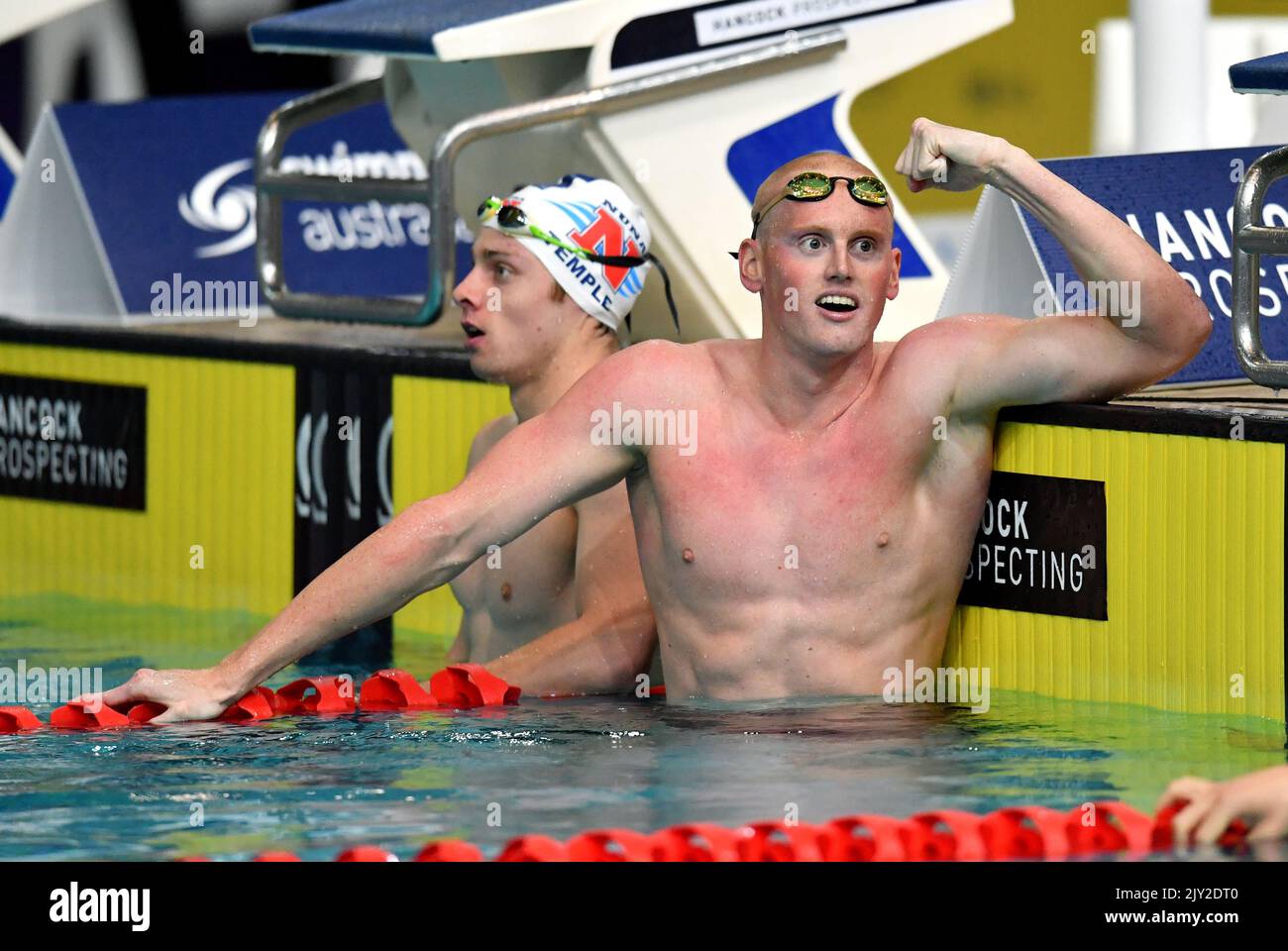 Australian swimmer David Morgan (right) celebrates winning the final of ...