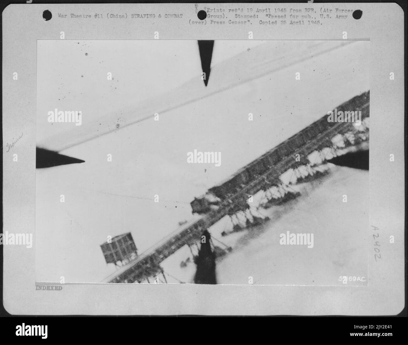 A Train, Caught On The Yellow River Bridge Of The Tung Pu Rr, Between ...