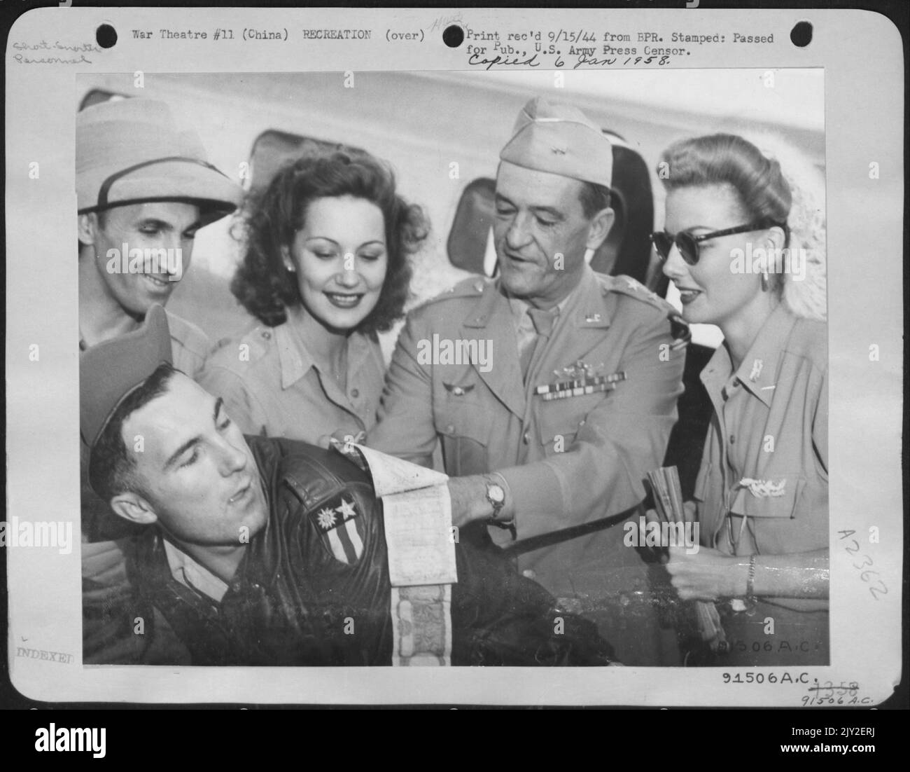 China - An Unidentified Crew Member Lends His Back As Major General C.L ...