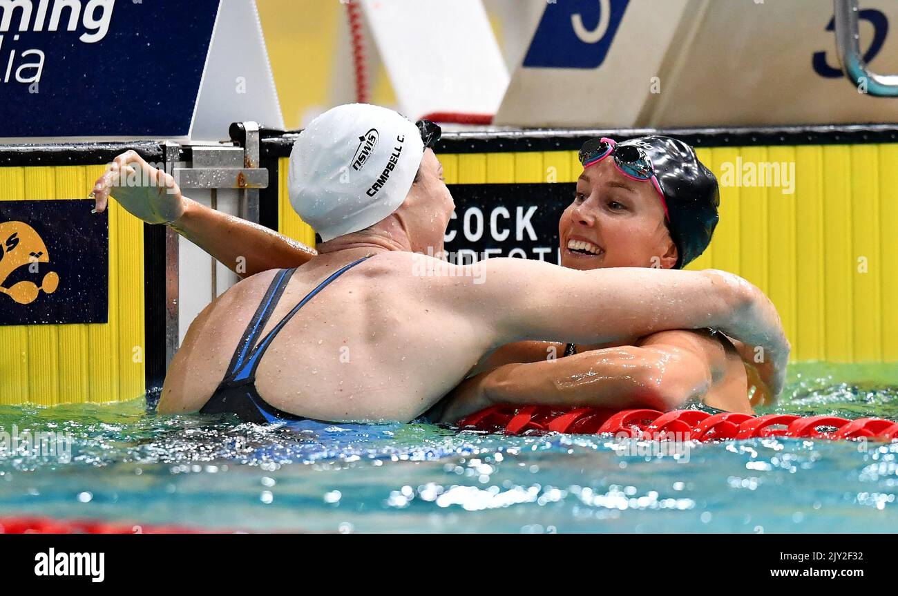 Australian swimmer Cate Campbell (left) is seen hugging Emma McKeon ...