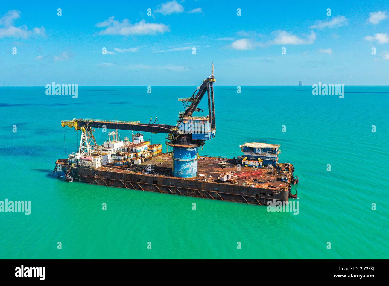 Aerial view of abandoned and grounded ship, platform type ship ...