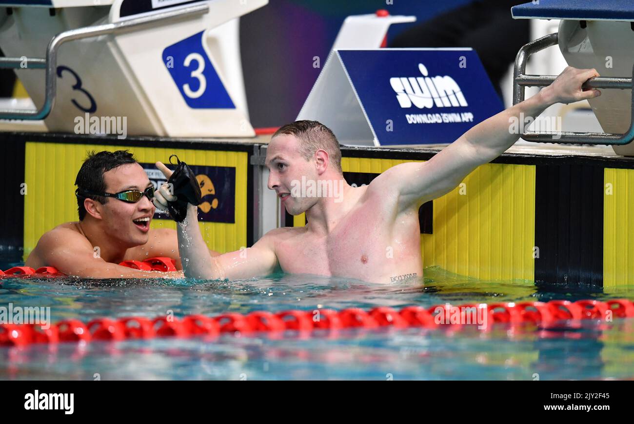 Australian swimmer Matthew Wilson (right) reacts after winning the ...