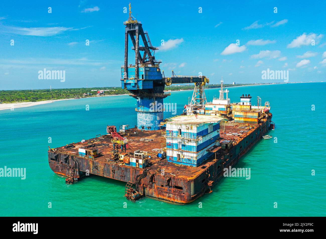 Aerial view of abandoned and grounded ship, platform type ship ...
