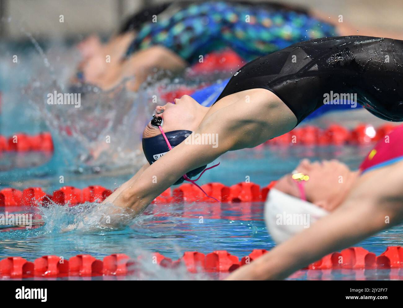Australian swimmer Minna Atherton (centre) is seen in action at the ...