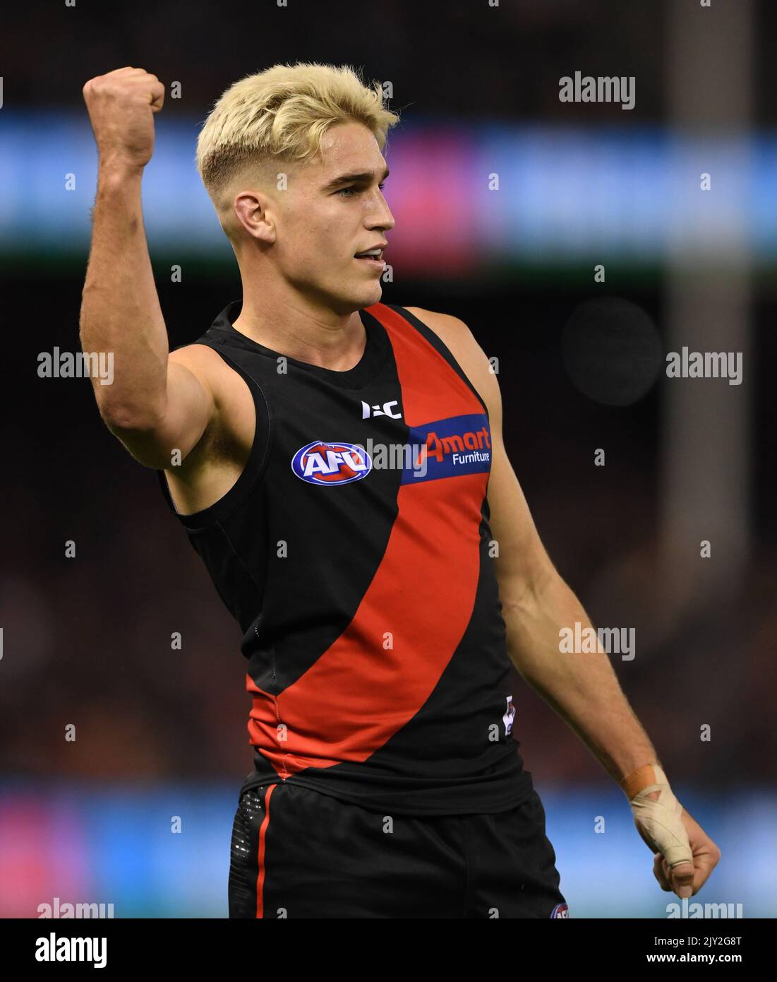 Matt Guelfi of the Bombers reacts after kicking a goal during the Round ...