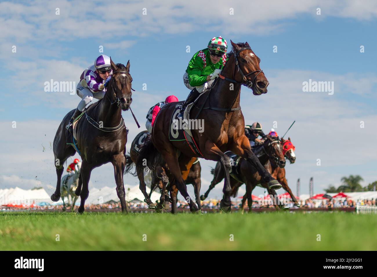 Jockey Sean Cormack rides Smartypy (centre) to victory in race 3, the ...