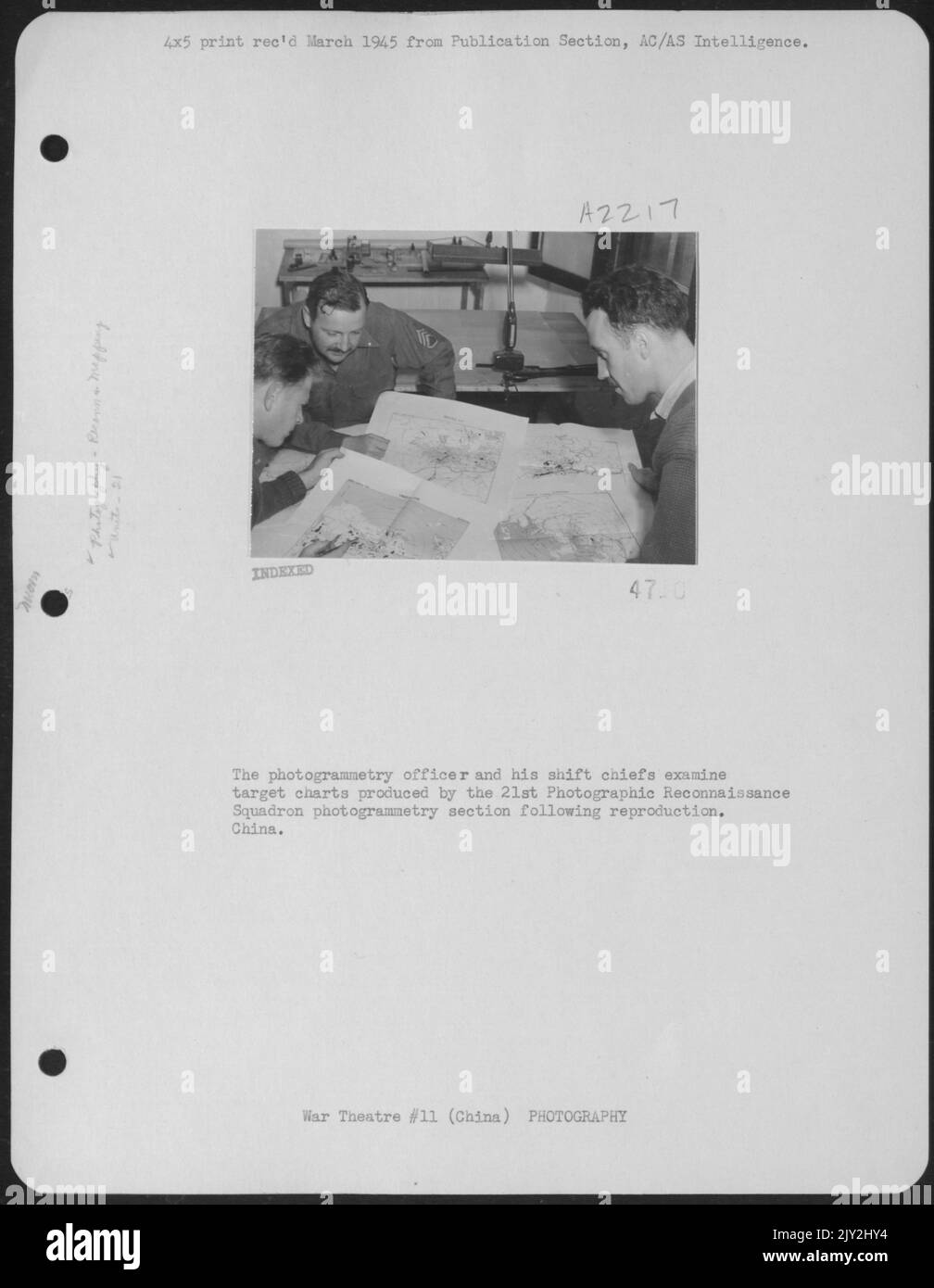 The Photogrammetry Officer And His Shift Chiefs Examine Target Charts ...