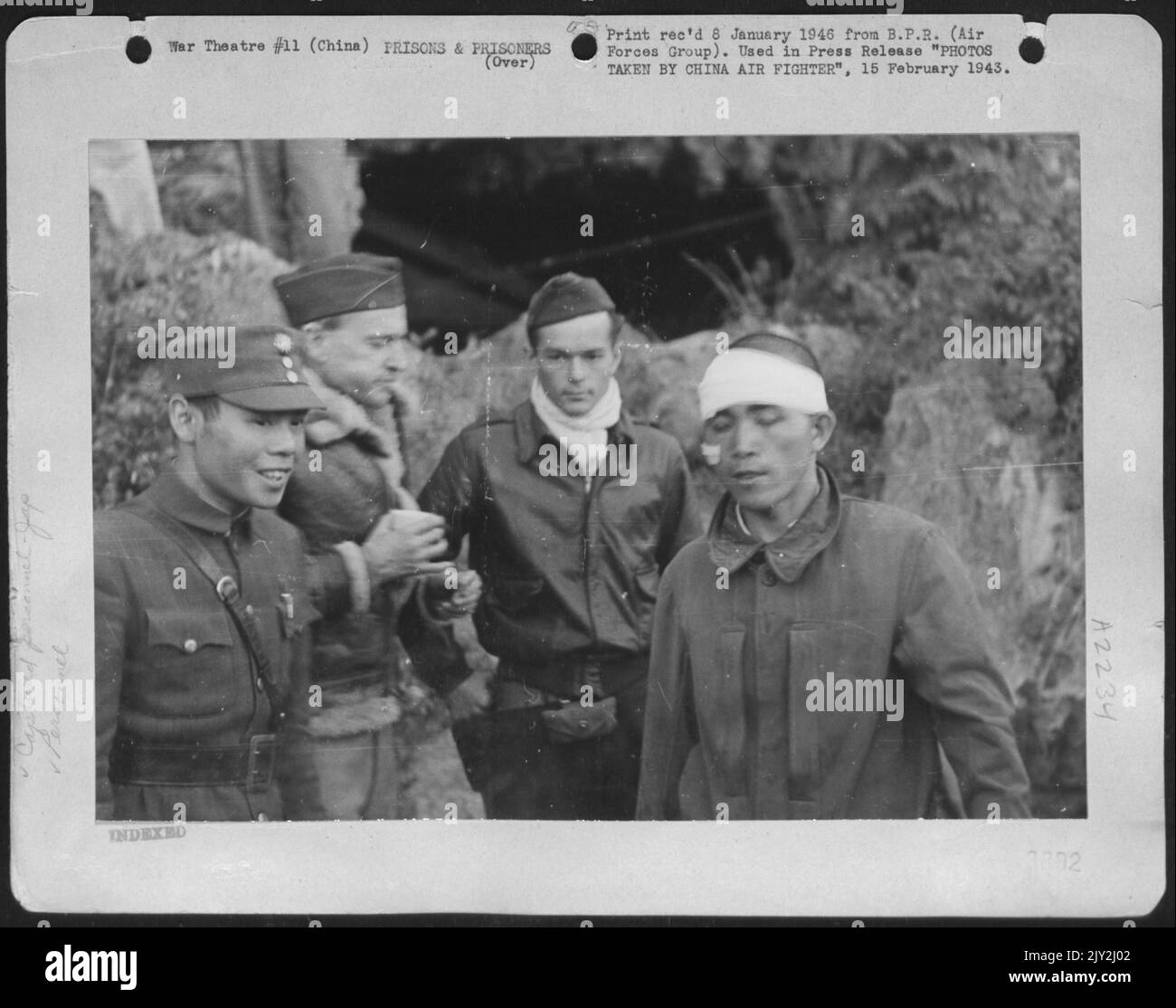 Japaneseanese Prisoner Of War Being Questioned. Left To Right, Chinese ...