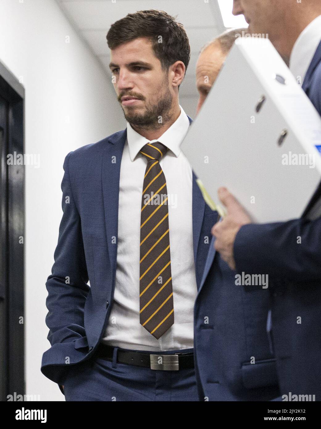 Hawthorn Hawks player Ben Stratton (left) arrives to front the AFL ...