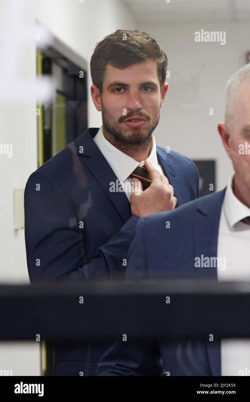 Hawthorn captain Ben Stratton leaves the AFL tribunal at Marvel Stadium ...