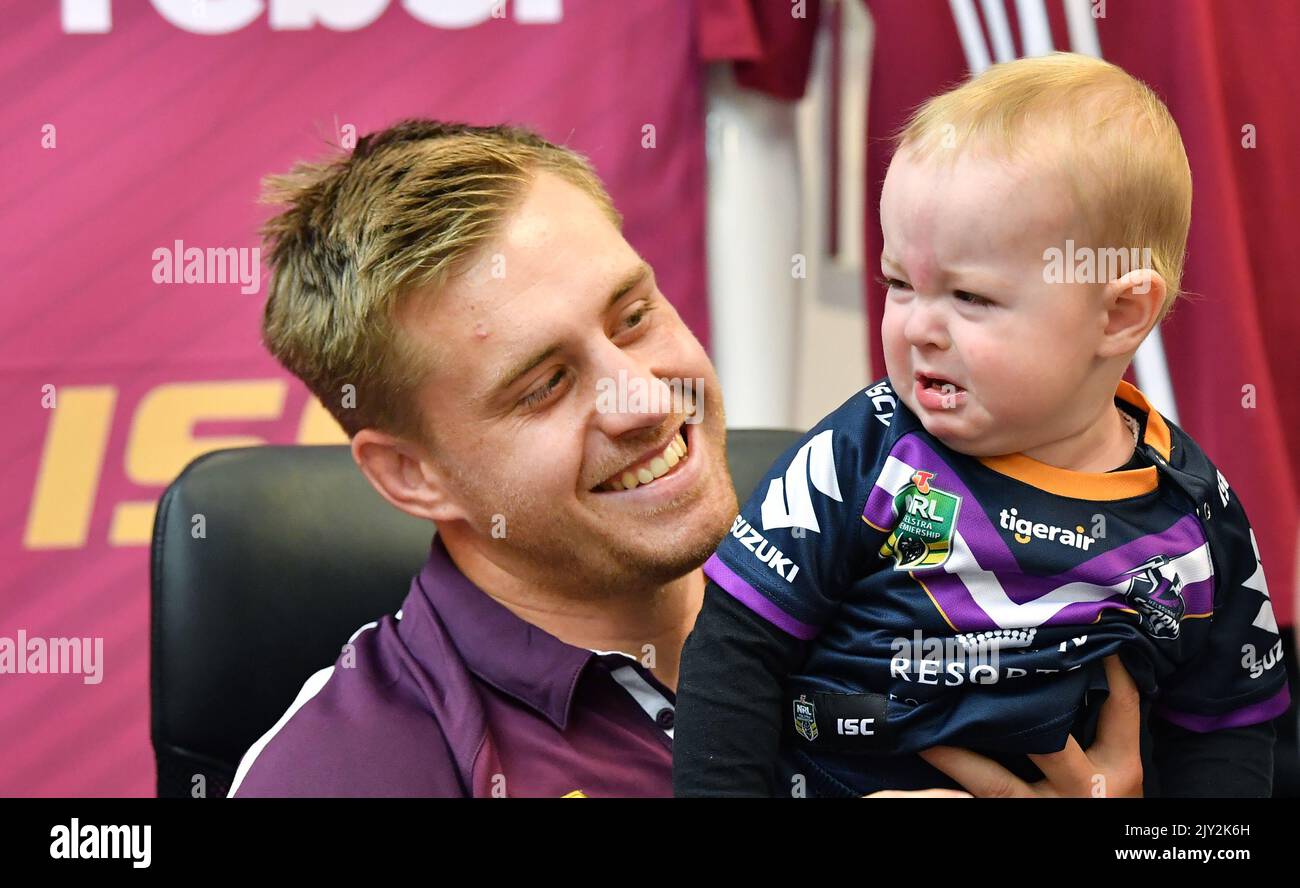 Queensland State of Origin player Cameron Munster (left) is seen with ...