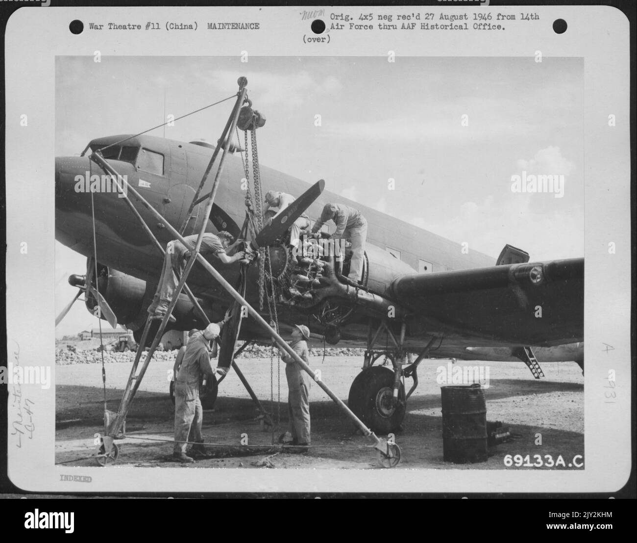 Mechanics Repair The Engine Of A Douglas C-47 At A 14Th Air Force Base ...