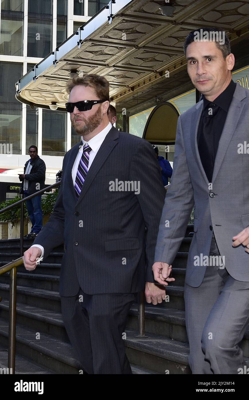 NSW Police Officer Harry Thomas (left) leaves the Downing Centre Local ...