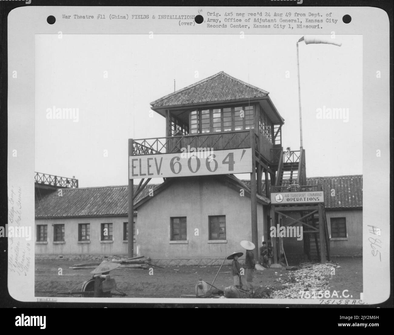 Chinese Coolies Work In Front Of The Control Tower Of The 4Th Army ...