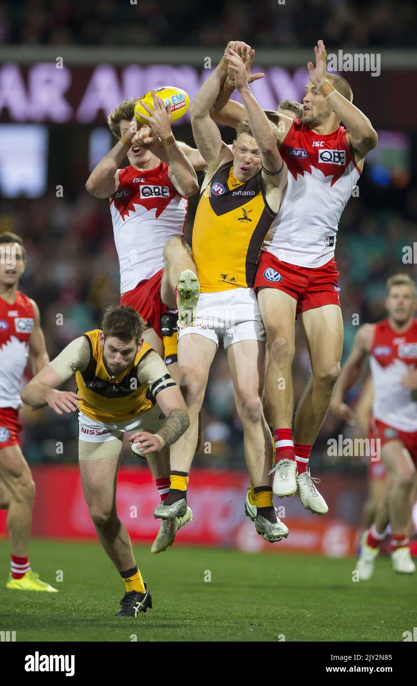 Nick Blakey of the Swans takes a mark then kicks a goal during the ...