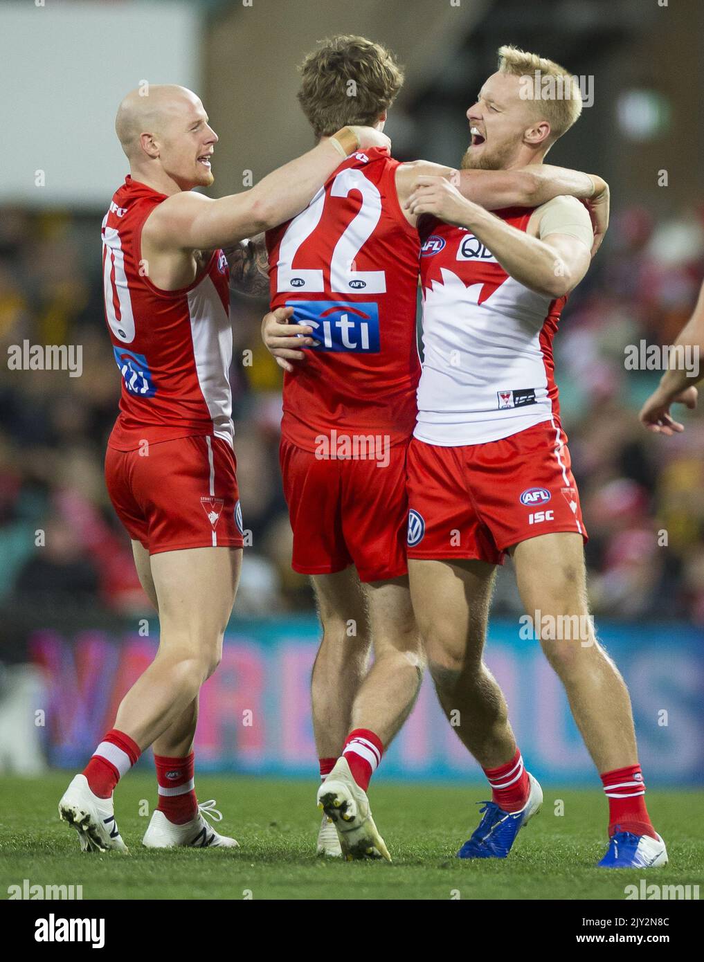 Nick Blakey of the Swans takes a mark then kicks a goal during the ...