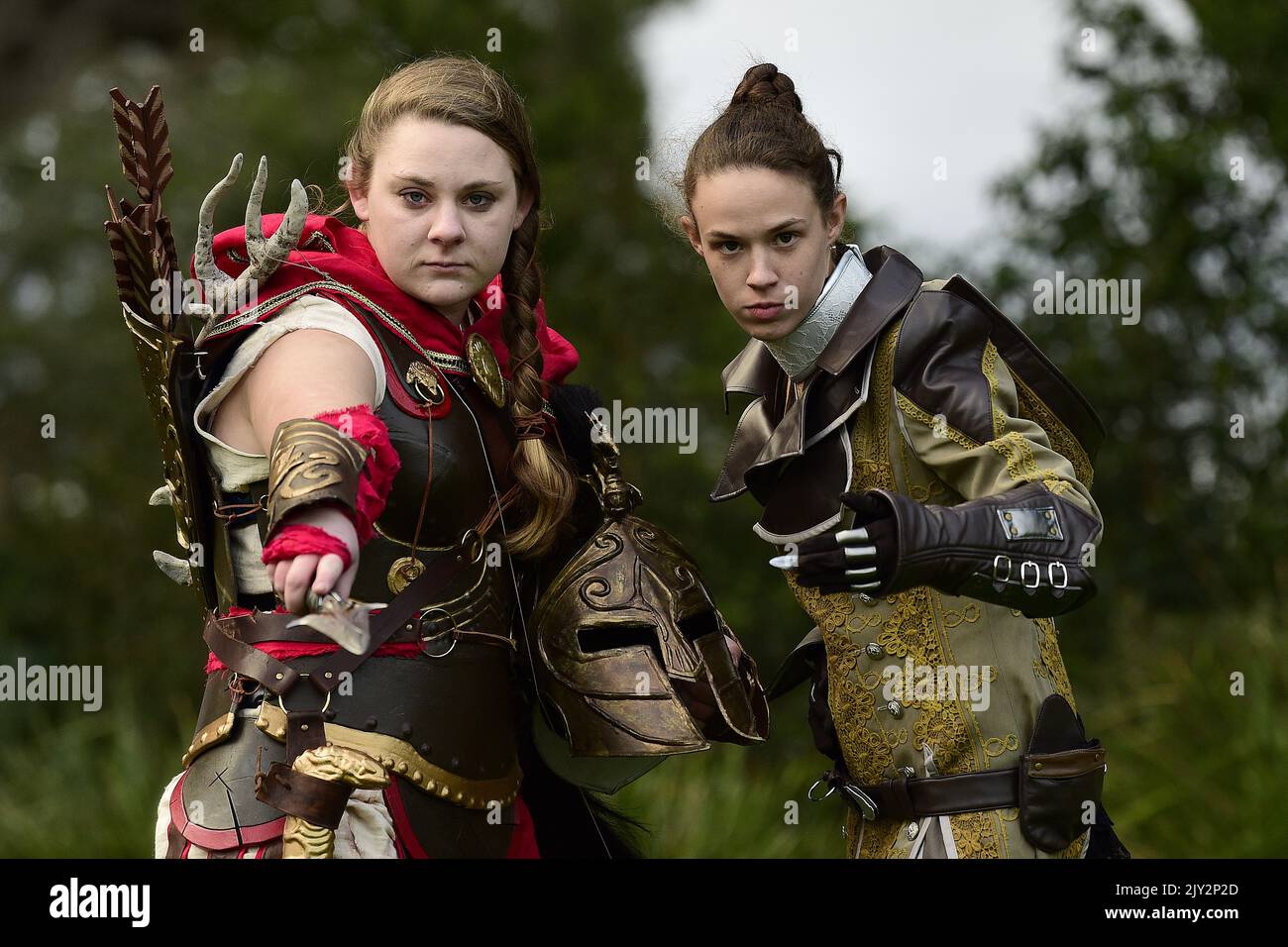 Michaela Matthews (left) dressed in cosplay as Kassandra from Assassin ...
