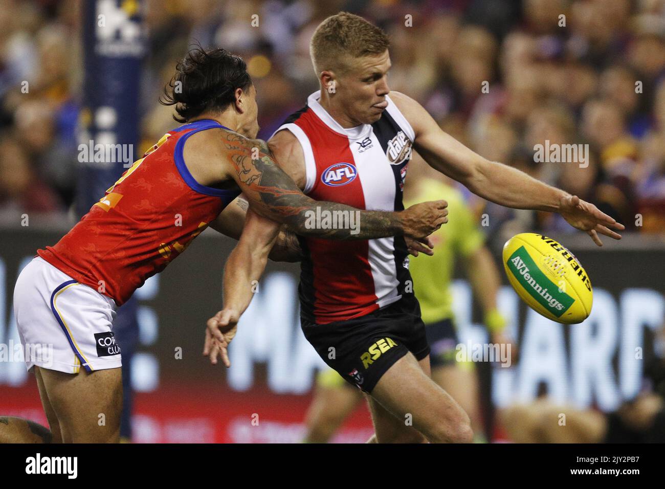 Dan Hannebery of the Saints kicks the ball under pressure during the ... Dan Hannebery of the Saints kicks the ball under pressure during the ...
