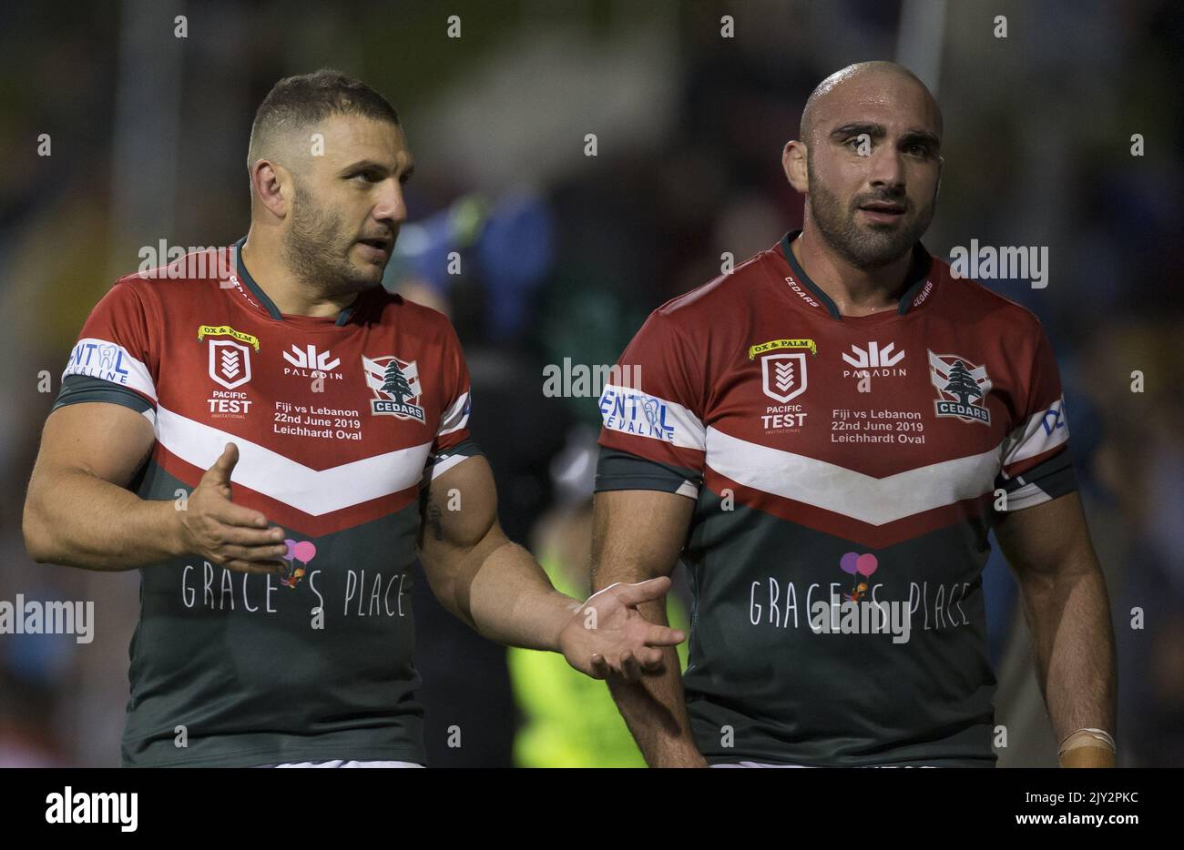 Robbie Farah and Tim Mannah of Lebanon are taken off during the Pacific ...