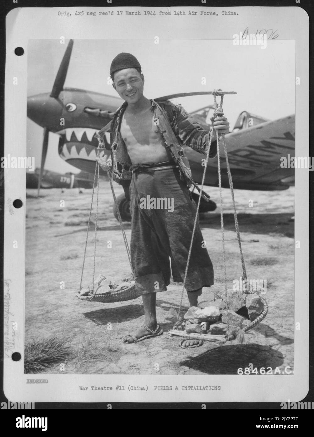 A Chinese Carrying Rock For The Construction Of A Field Of The 14Th Air ...