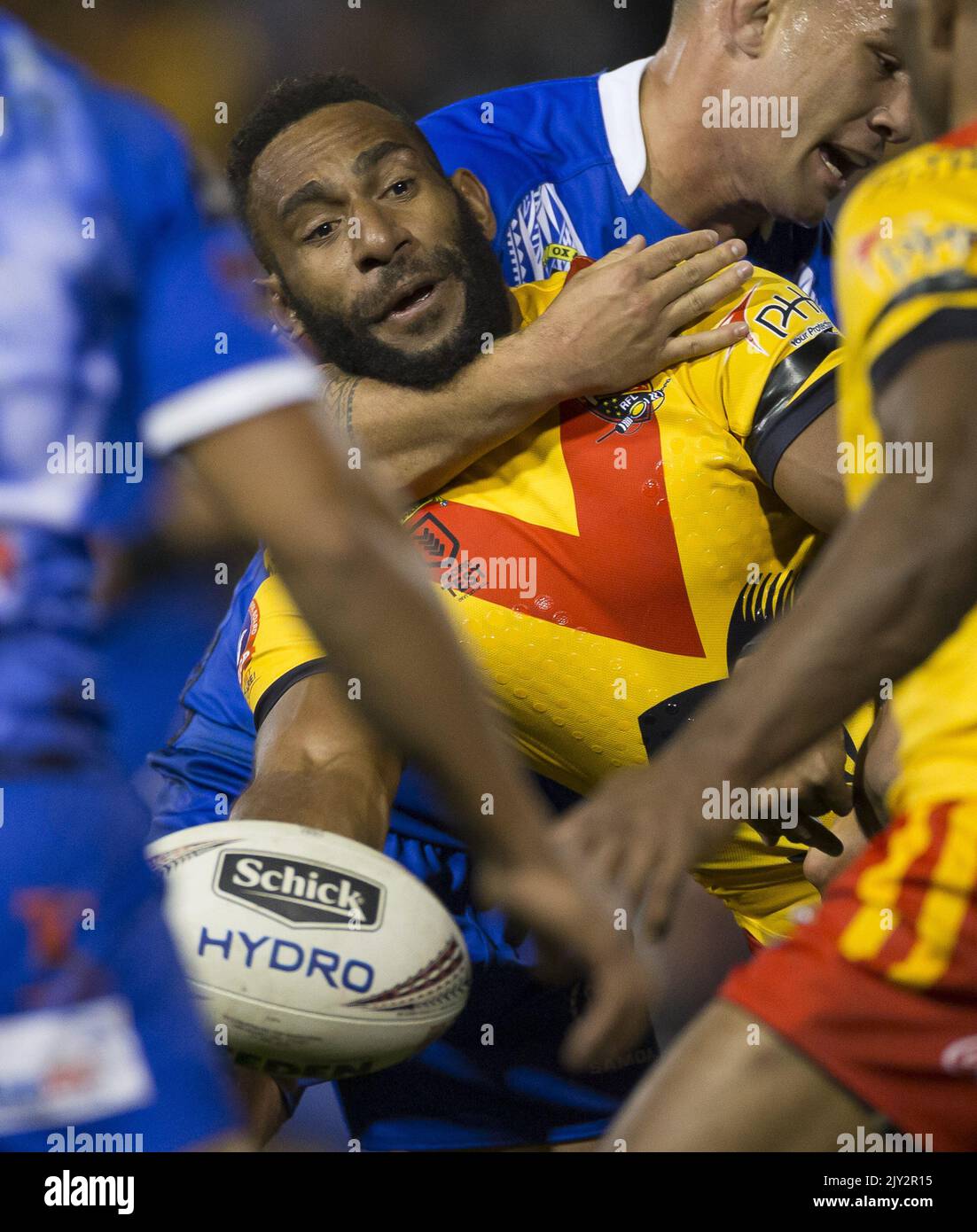 Moses Meninga of PNG gets the ball away during the Pacific Test ...