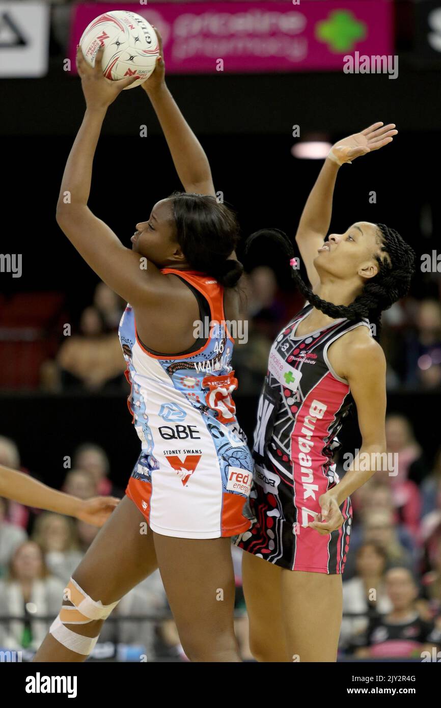 Sam Wallace of the Swifts competes with Shamera Sterling of the ...