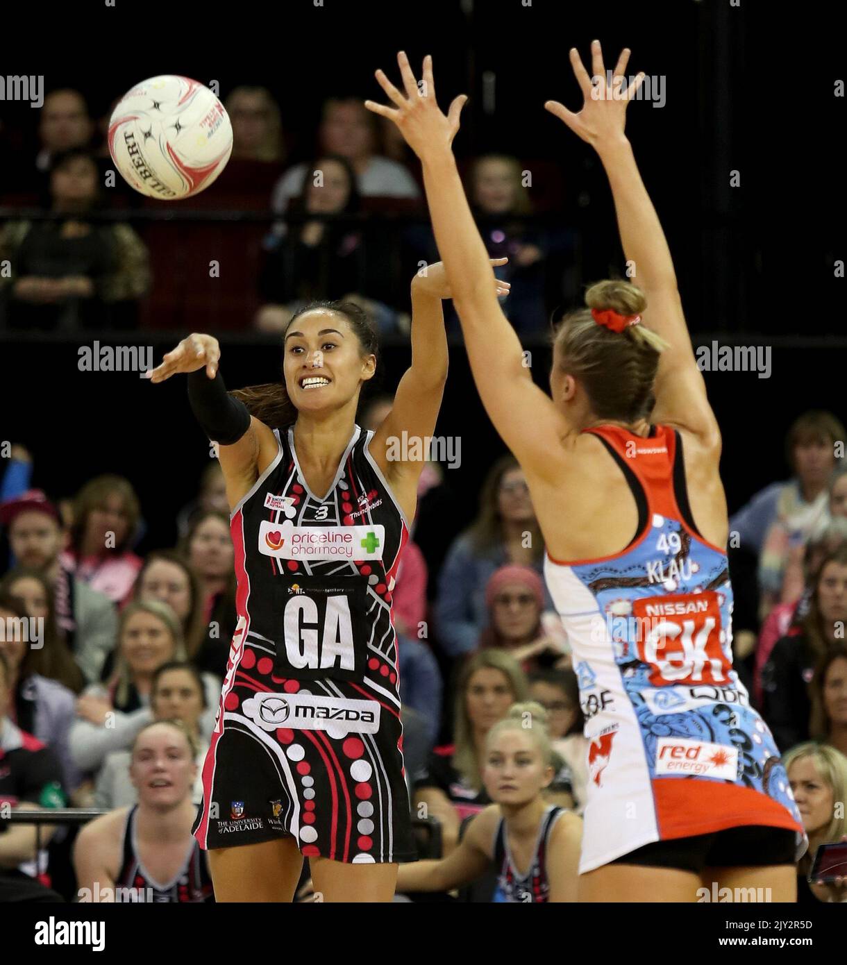 Maria Folau of the Thunderbirds competes with Sarah Klau of the Swifts ...