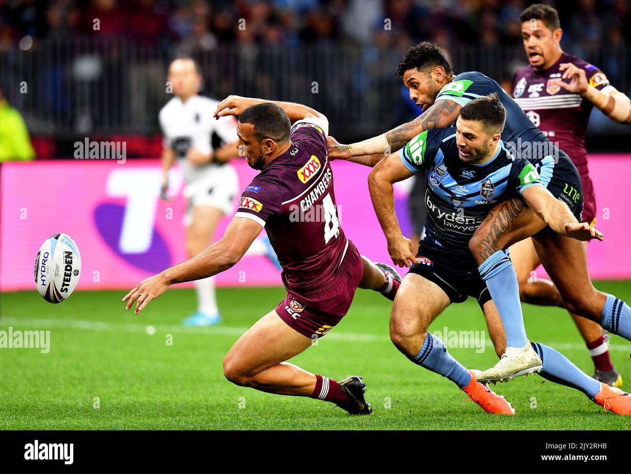Will Chambers (left) of the Maroons fails to get to the ball over the ...