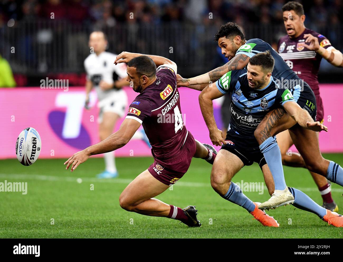 Will Chambers (left) of the Maroons fails to get to the ball over the ...
