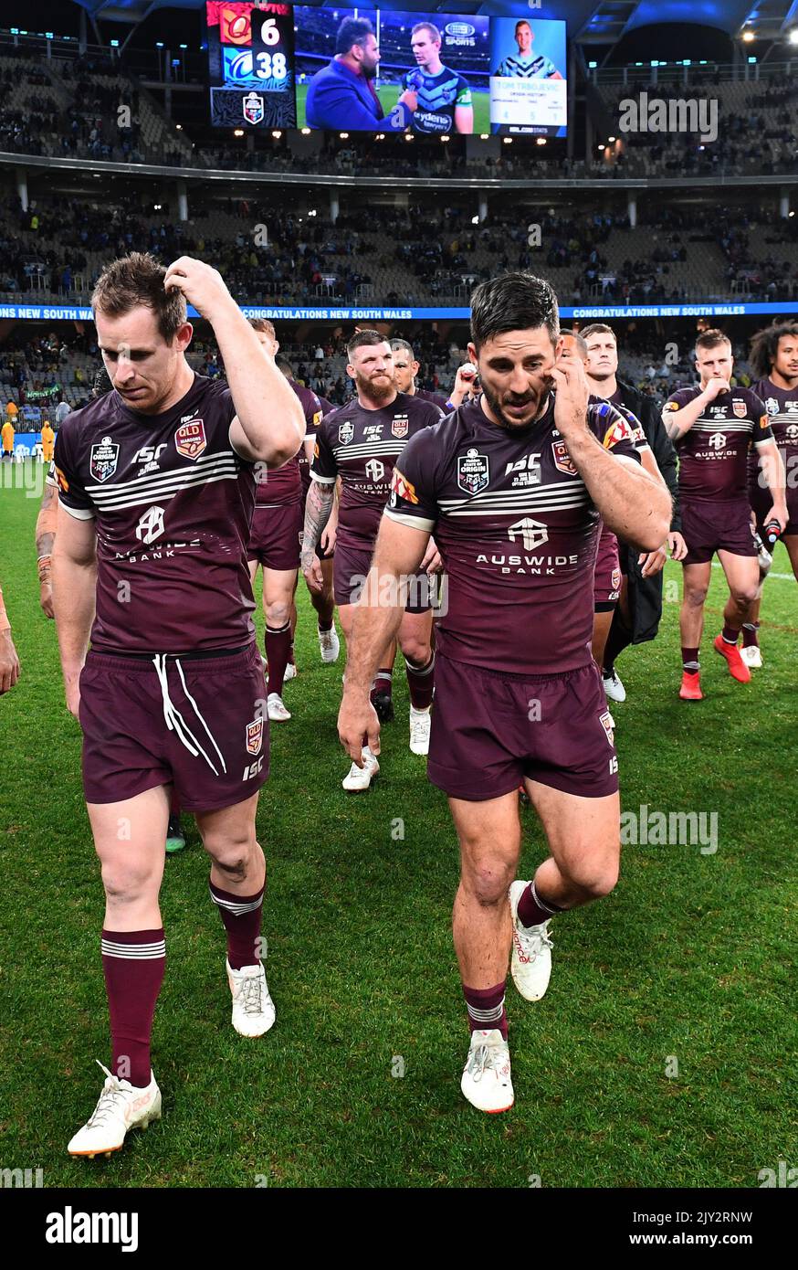 Maroons players Michael Morgan (left) and Ben Hunt are dejected ...
