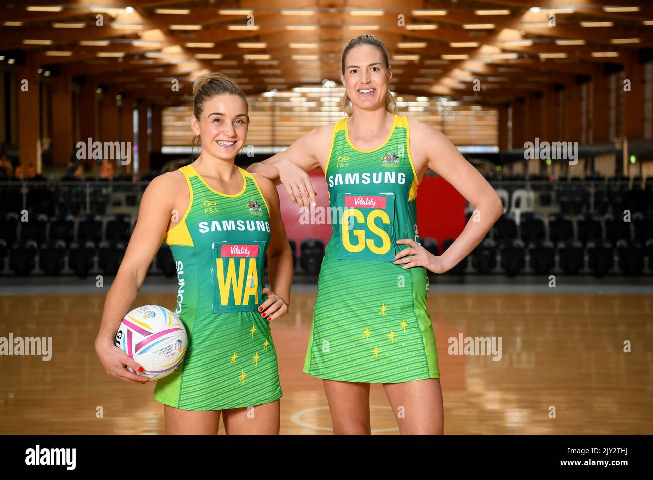 Diamonds players Liz Watson (left) and Caitlin Bassett pose for a photo ...
