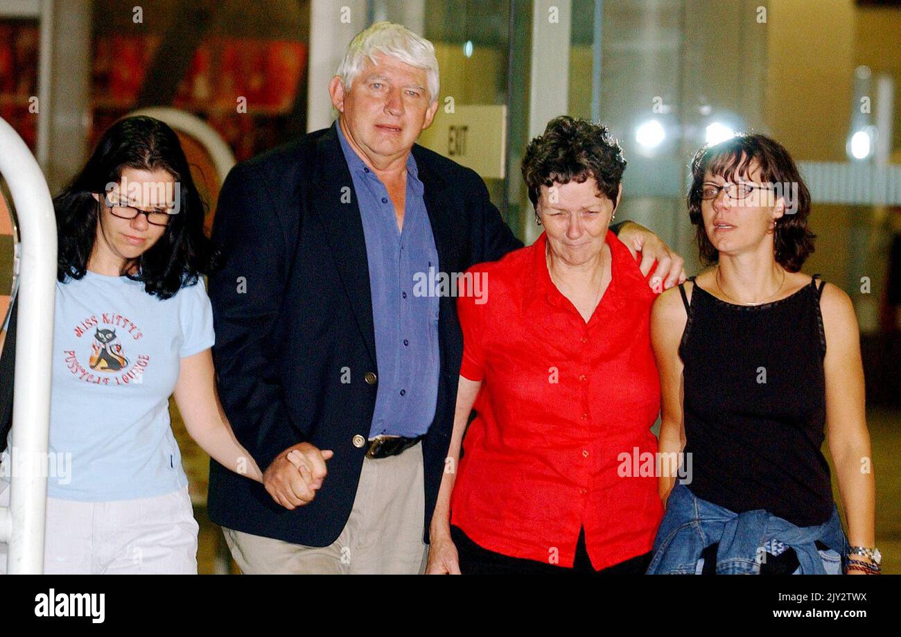 Frank and Kerry Slarke (centre) with their two daughters Sally (left ...