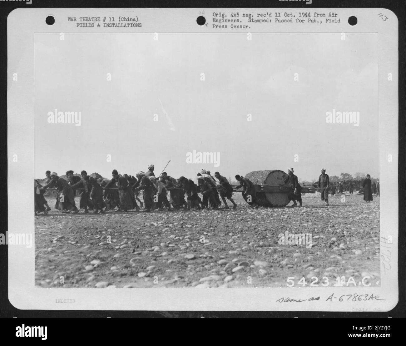 With no heavy machinery available in far off China, coolies band ...