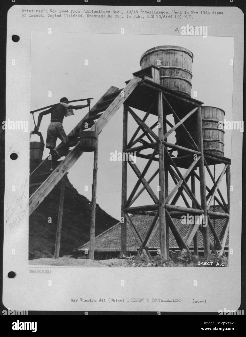 Hauling water, this coolie replenishes tanks that supply a 21st Photo ...