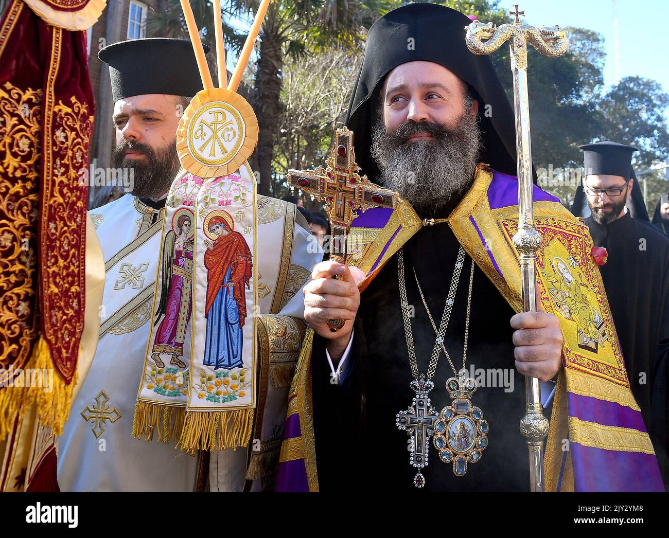 New Greek Orthodox leader Archbishop Makarios (right) is seen arriving ...