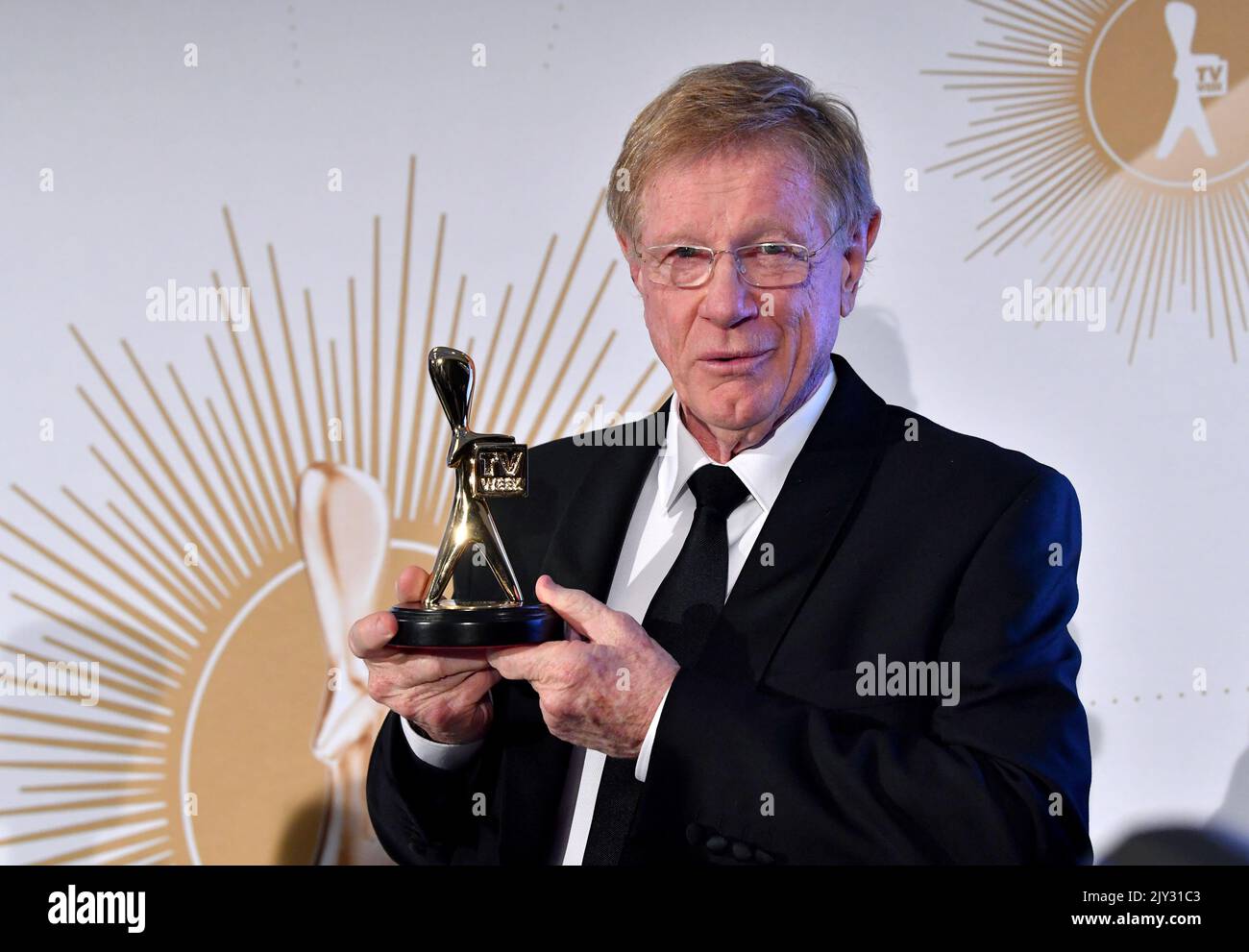 Journalist Kerry O'Brien poses for a photograph after being inducted ...