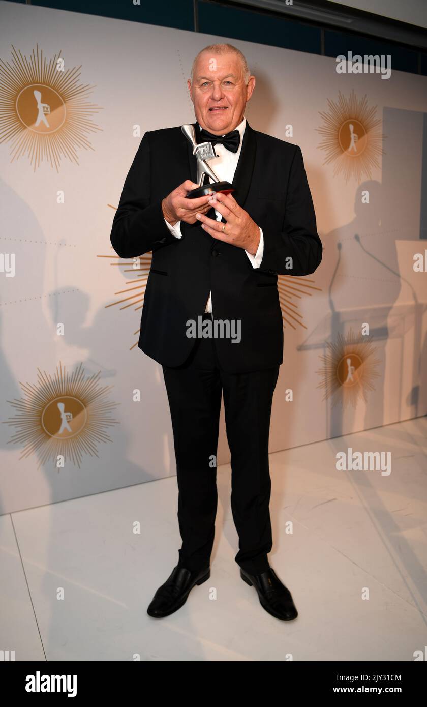 Actor Ron Iddles poses with the Logie for the Most outstanding factual ...