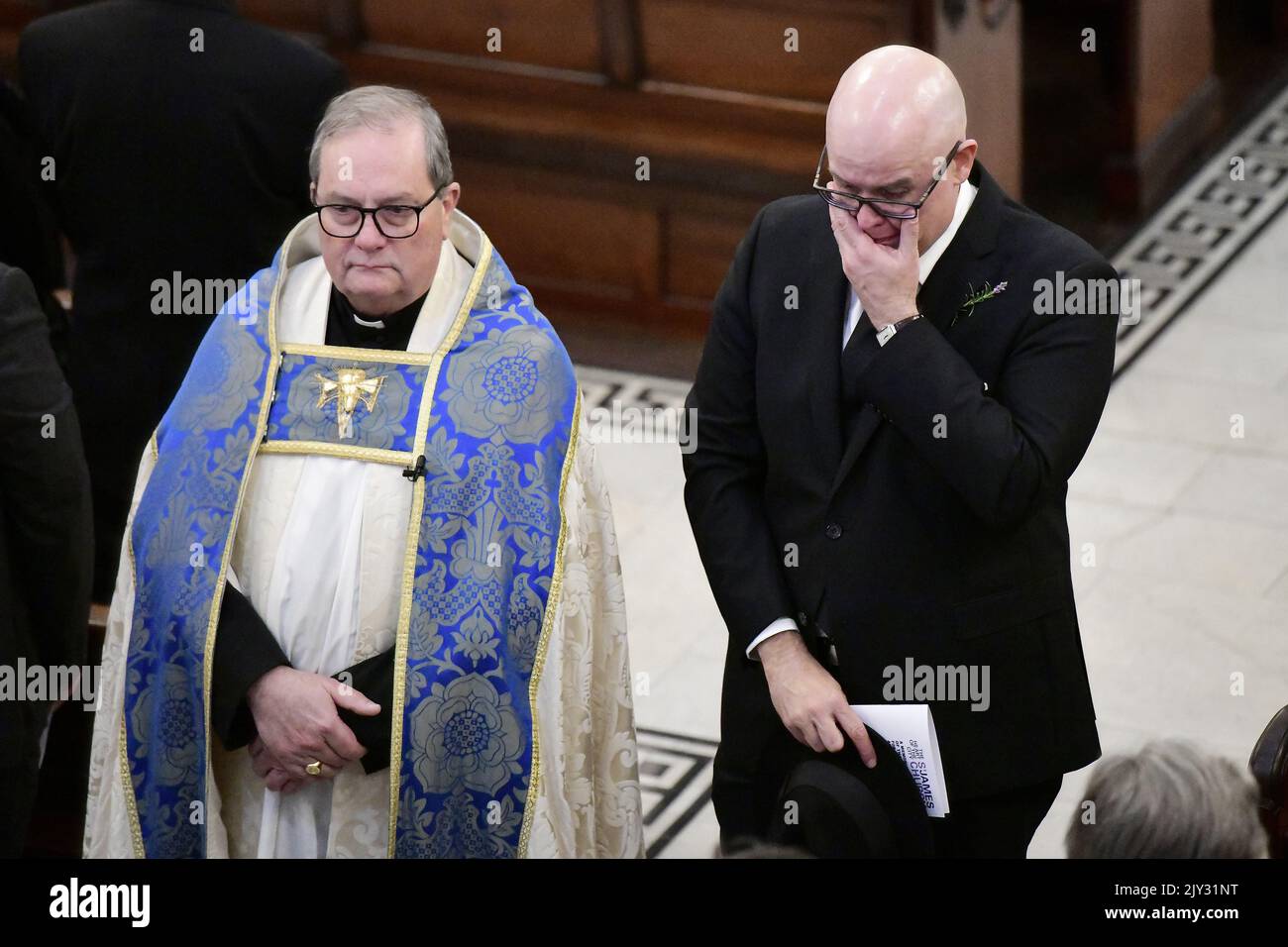 Husband Trent Goldsack (right) reacts during the Memorial Service for ...