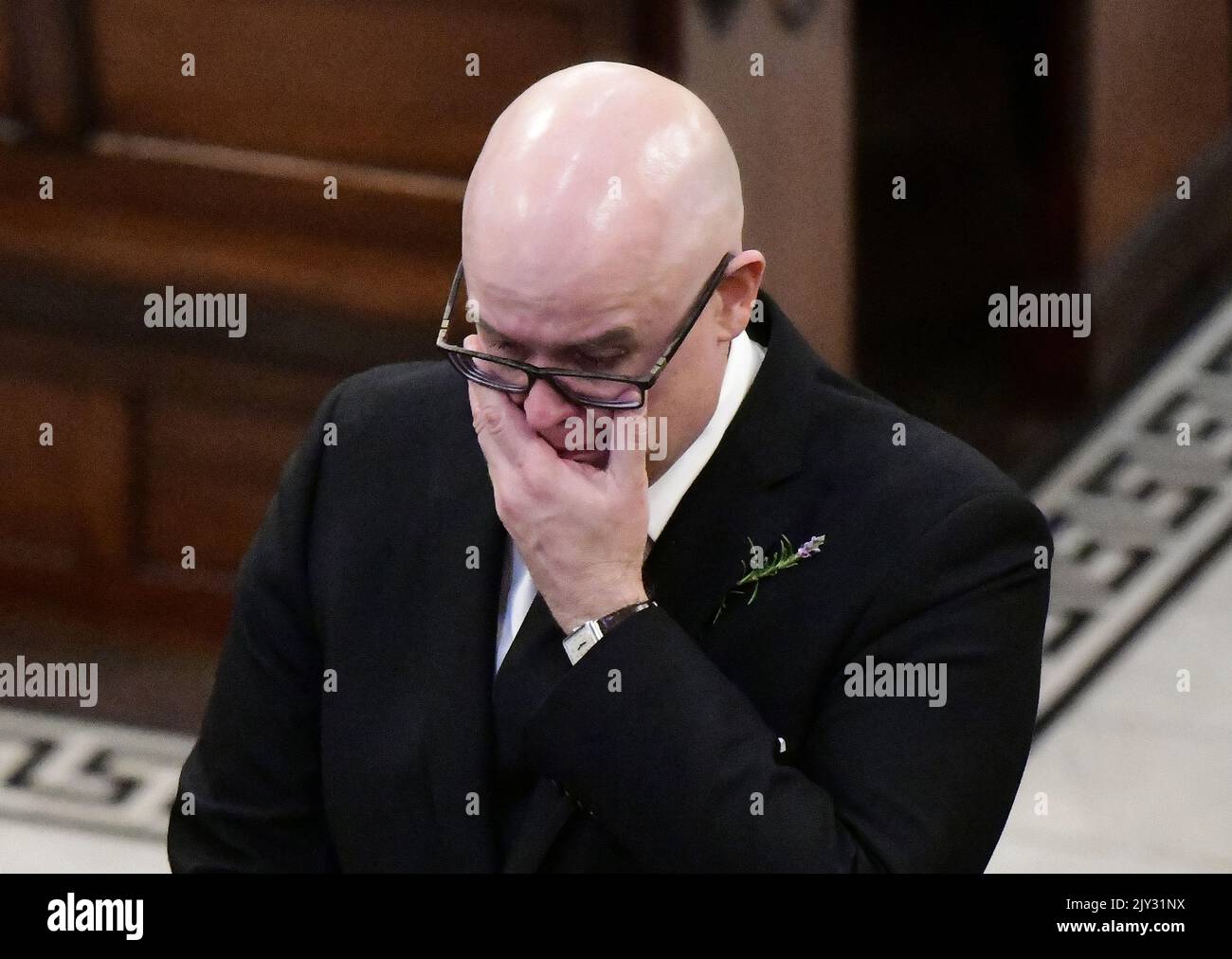Husband Trent Goldsack reacts during the Memorial Service for ...