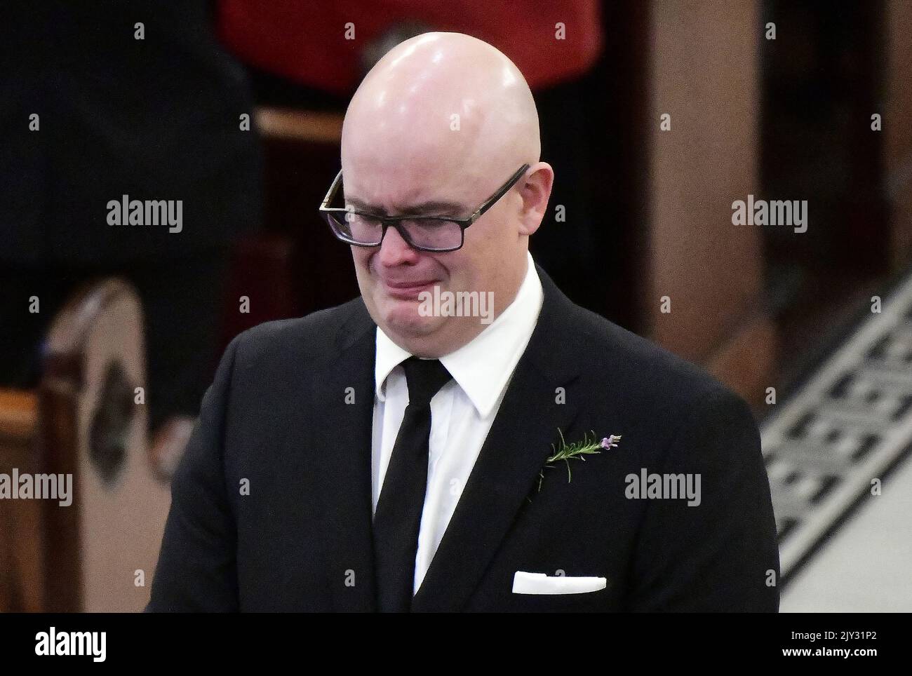 Husband Trent Goldsack reacts during the Memorial Service for ...