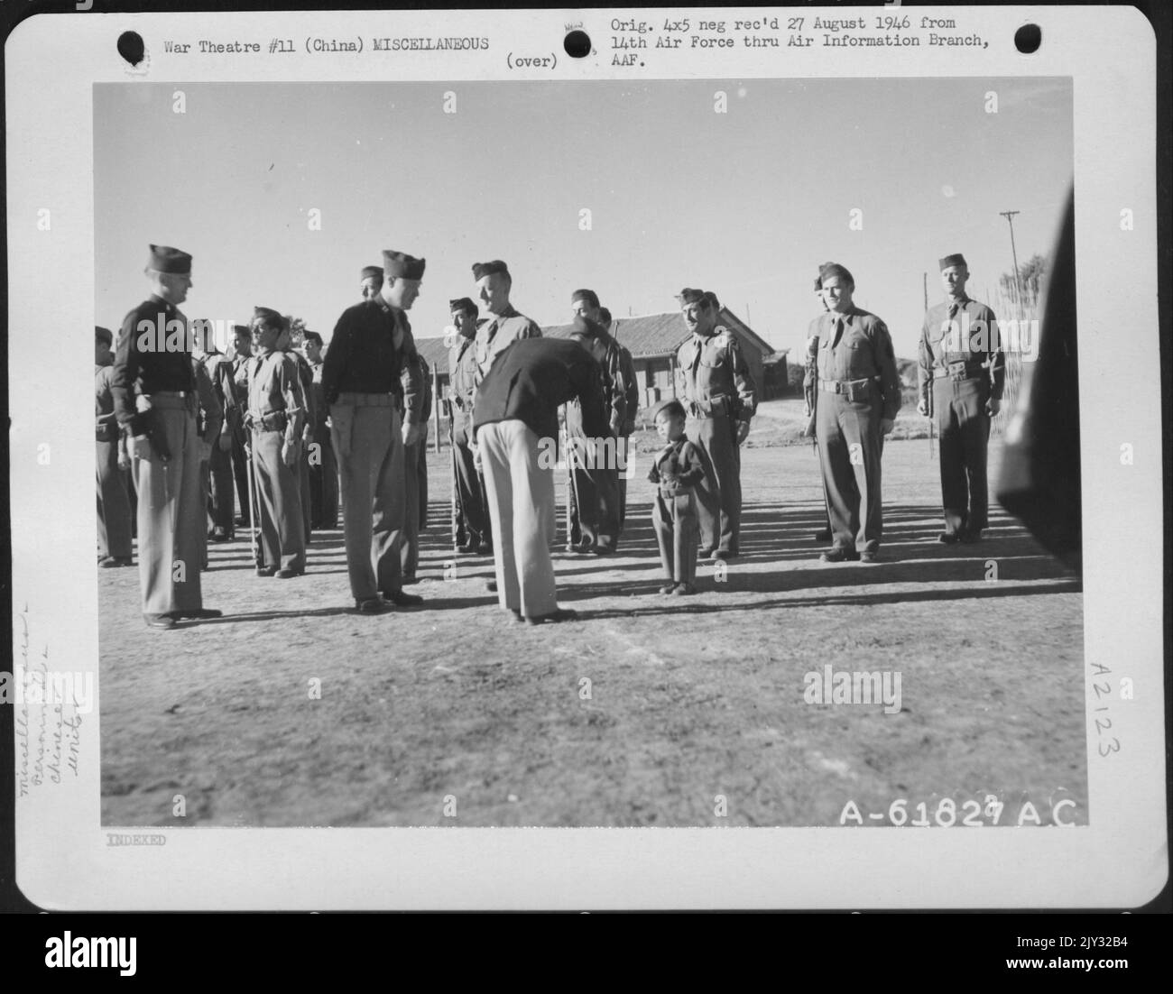 'Little Tiger Joe' Stands Inspection Right Along With His Foster ...