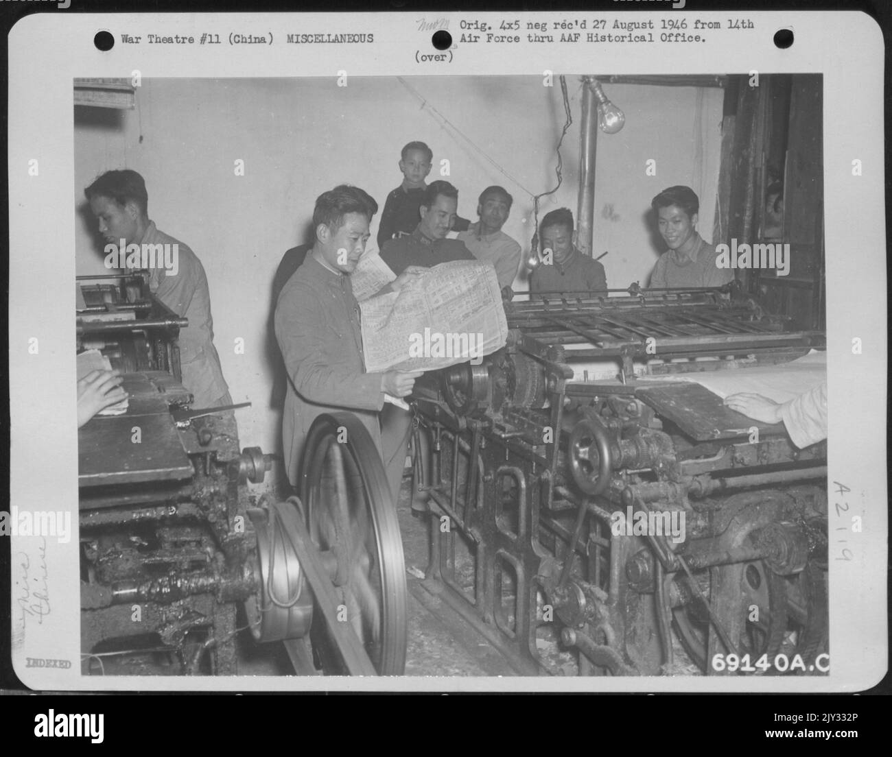 Members Of The Chinese Army, Visiting A Newspaper Plant, Read The Paper ...